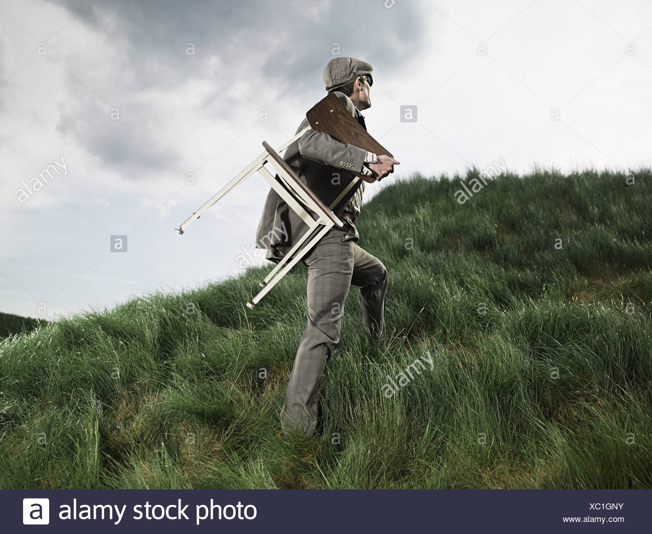 Carrying Chair Stock Photos & Carrying Chair Stock Images - Alamy