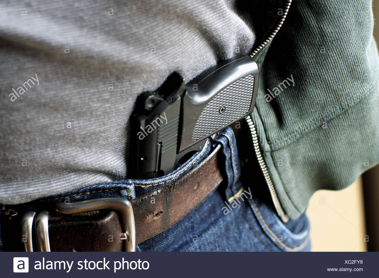 Hiding Pistol Stock Photos & Hiding Pistol Stock Images - Alamy