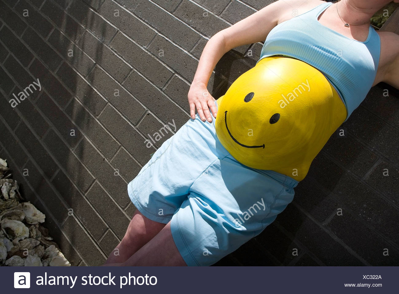 Smiley Face On Stomach High Resolution Stock Photography and Images - Alamy