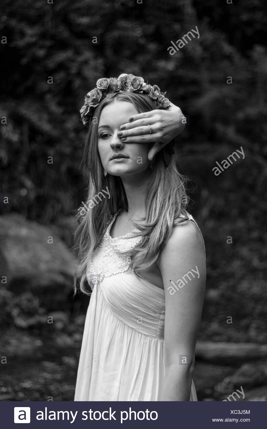 Woman Covering One Eye High Resolution Stock Photography and Images - Alamy