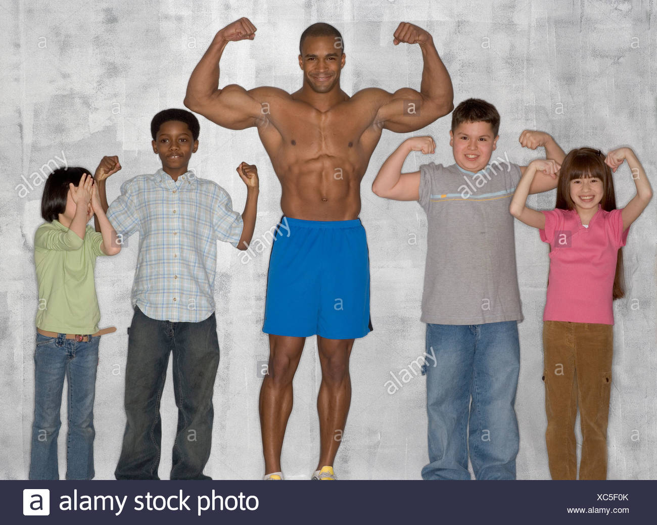 Asian Boy Flexing Muscles Stock Photos & Asian Boy Flexing Muscles ...