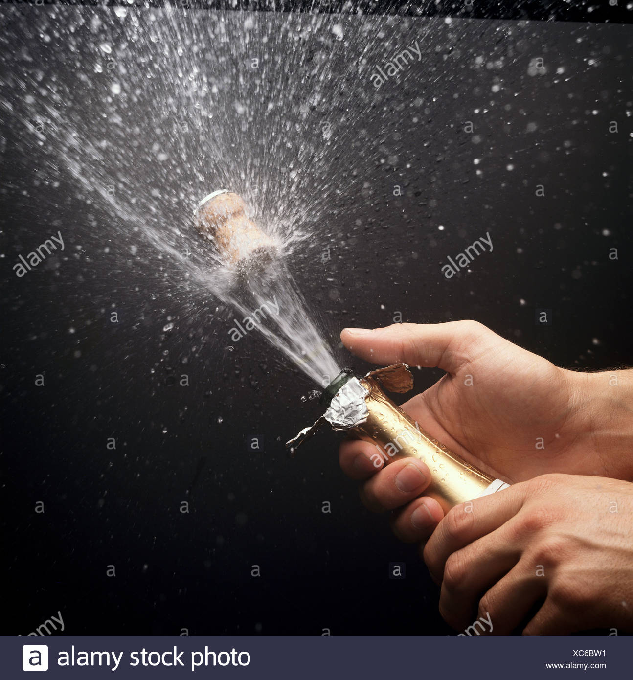 Popping Champagne Bottle Stock Photos & Popping Champagne Bottle Stock ...