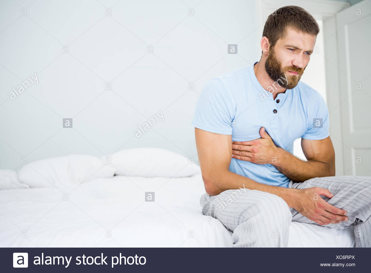 Touching Chest High Resolution Stock Photography and Images - Alamy