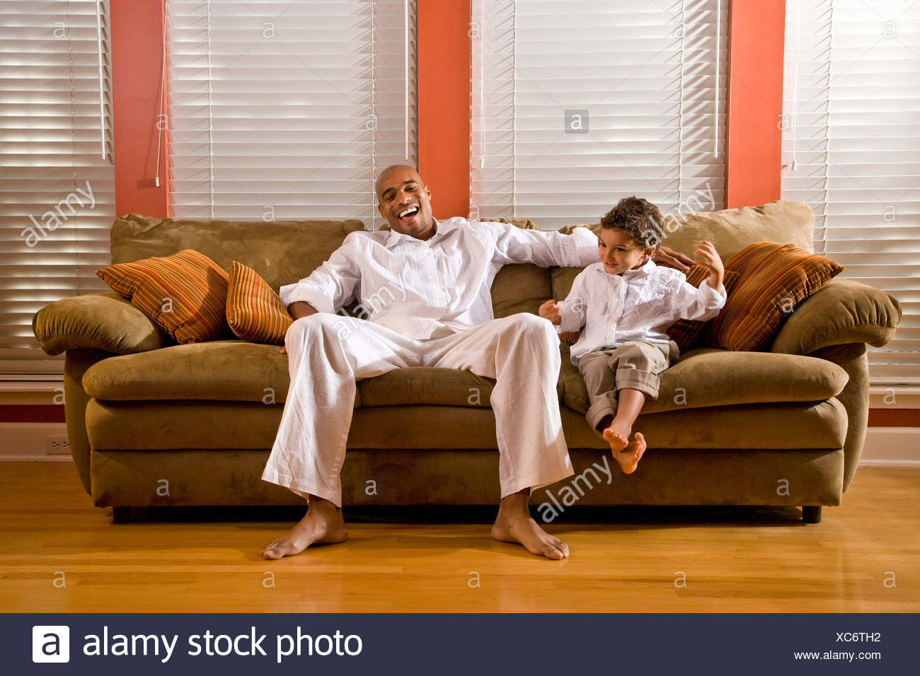Man Lounging On Sofa High Resolution Stock Photography and Images - Alamy