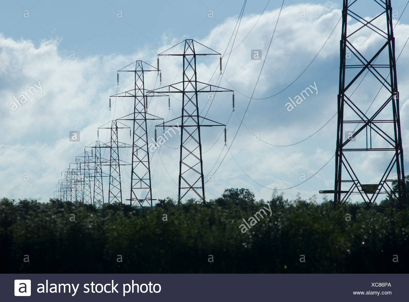 Electricity Pylons In A Field High Resolution Stock Photography and ...
