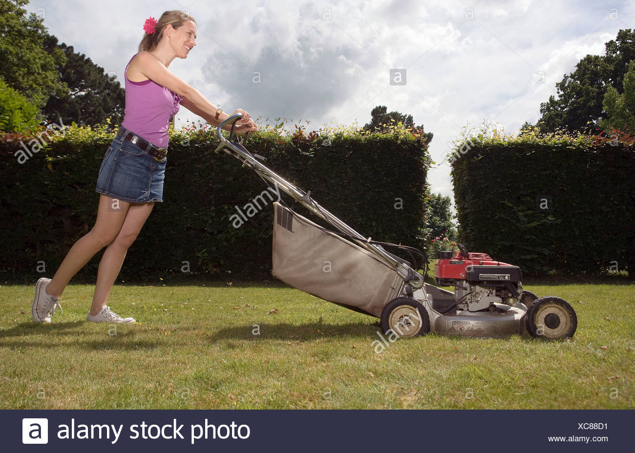 Woman Gardener Lawn High Resolution Stock Photography and Images - Alamy