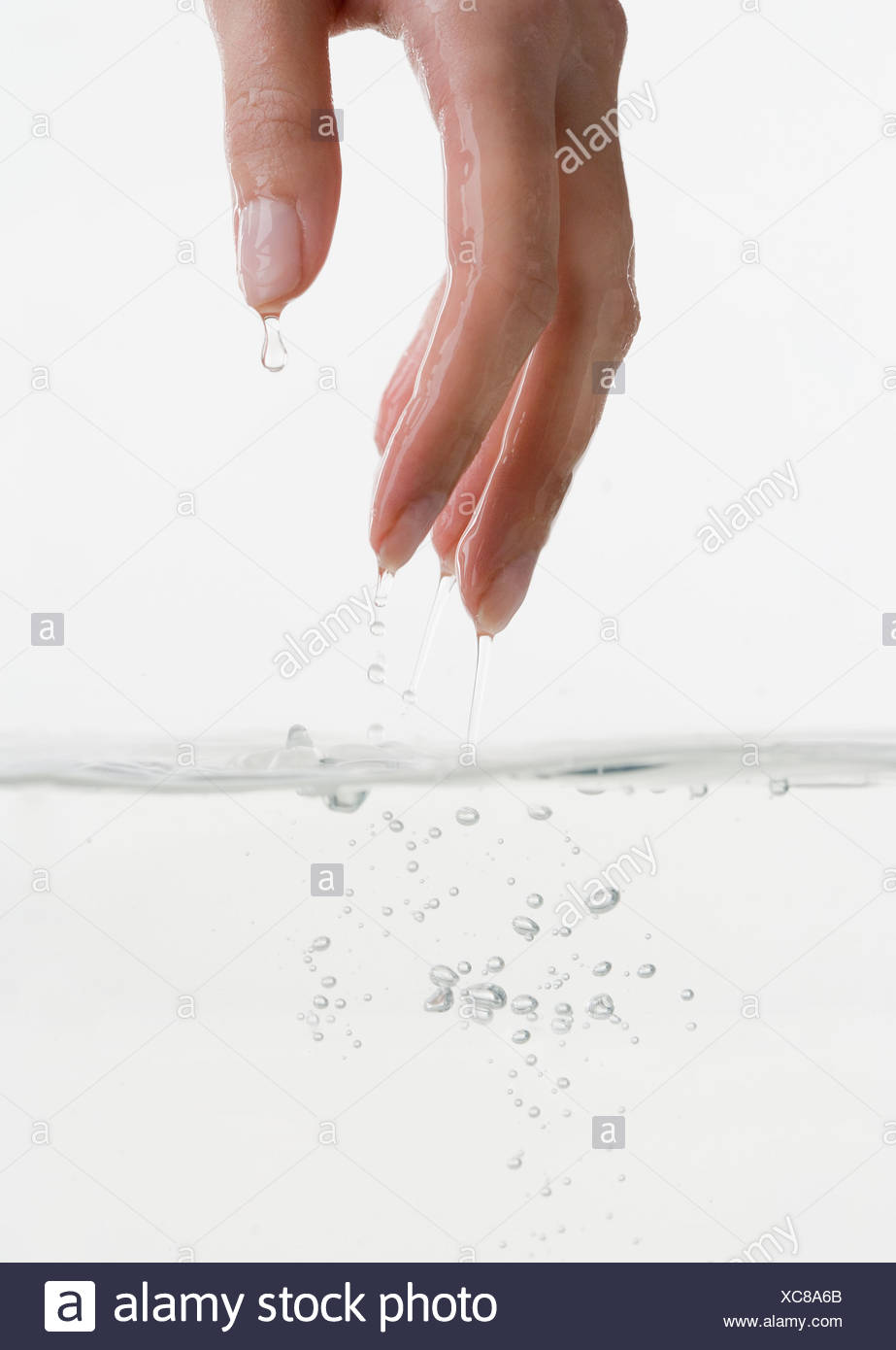 Water Dripping Hand Stock Photos & Water Dripping Hand Stock Images - Alamy