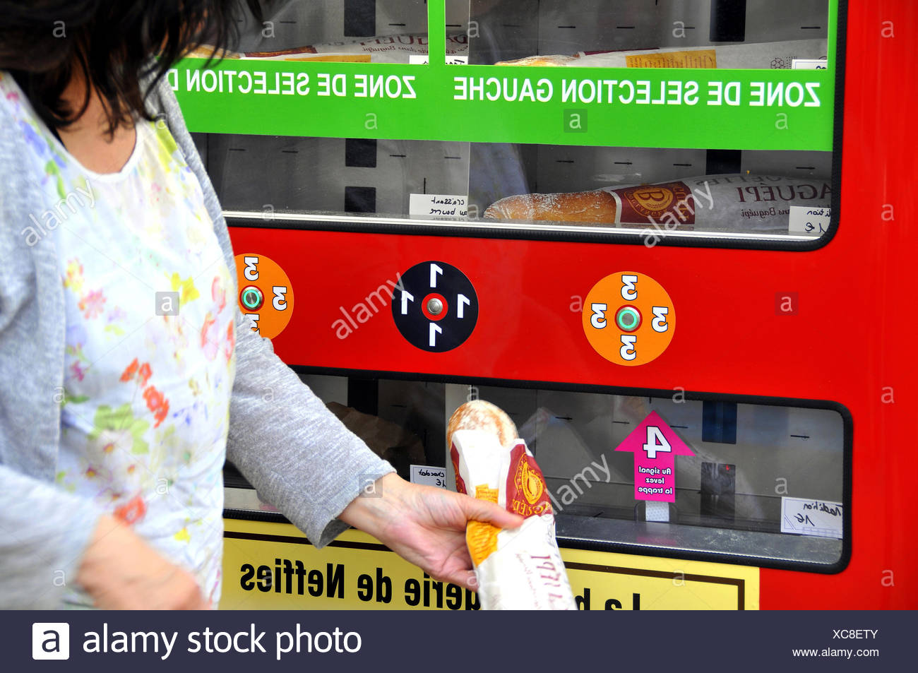 Woman Vending Machine Food Stock Photos & Woman Vending Machine Food ...