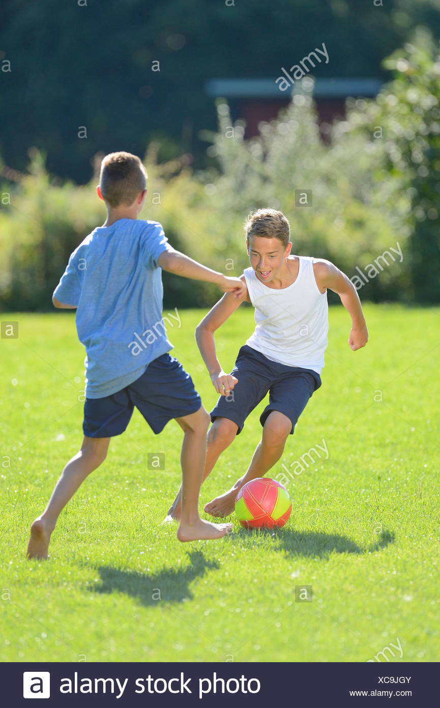 Boys Playing Football Stock Photos & Boys Playing Football Stock Images ...