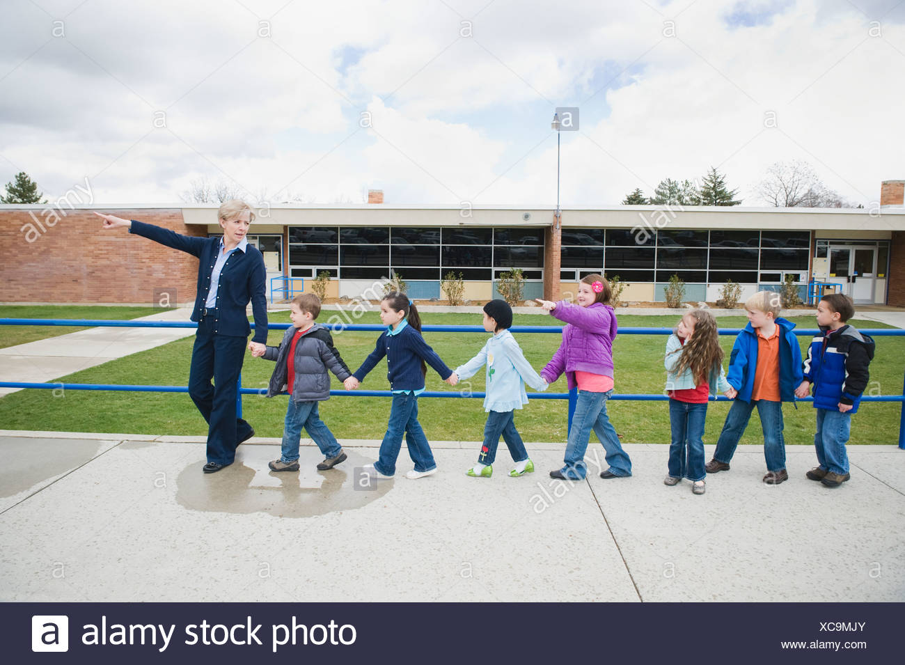 School Children Walking Line Stock Photos & School Children Walking ...