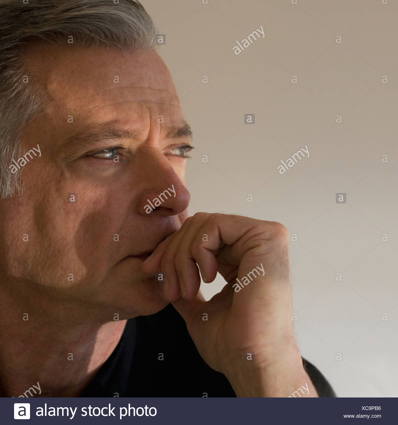 Solemn Face High Resolution Stock Photography and Images - Alamy