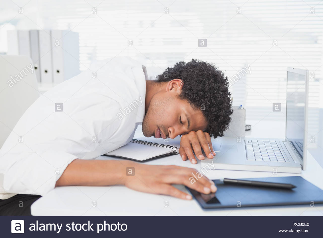 Man And Slumped And Chair High Resolution Stock Photography and Images ...