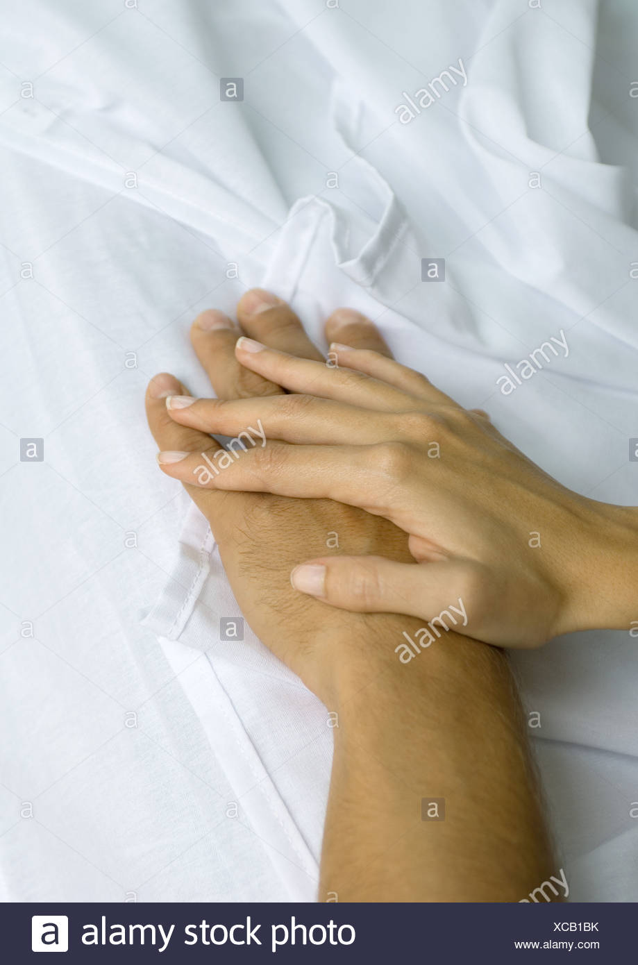 Close Up Hand In Hand Couple High Resolution Stock Photography and ...