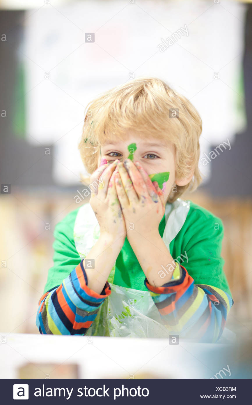 Hands Over Mouth High Resolution Stock Photography and Images - Alamy