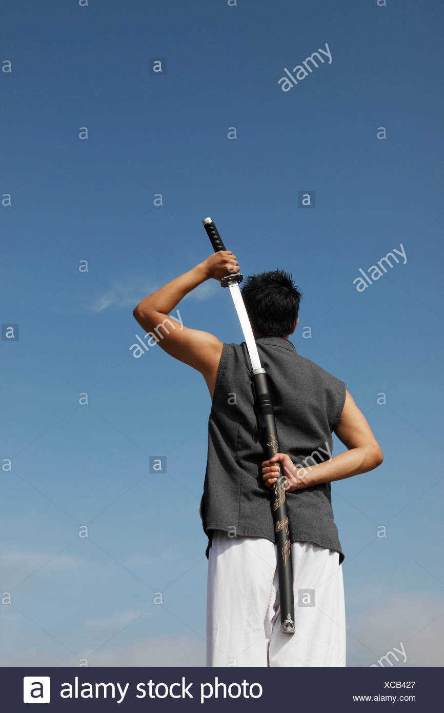Man Holding Sword Stock Photos & Man Holding Sword Stock Images - Alamy
