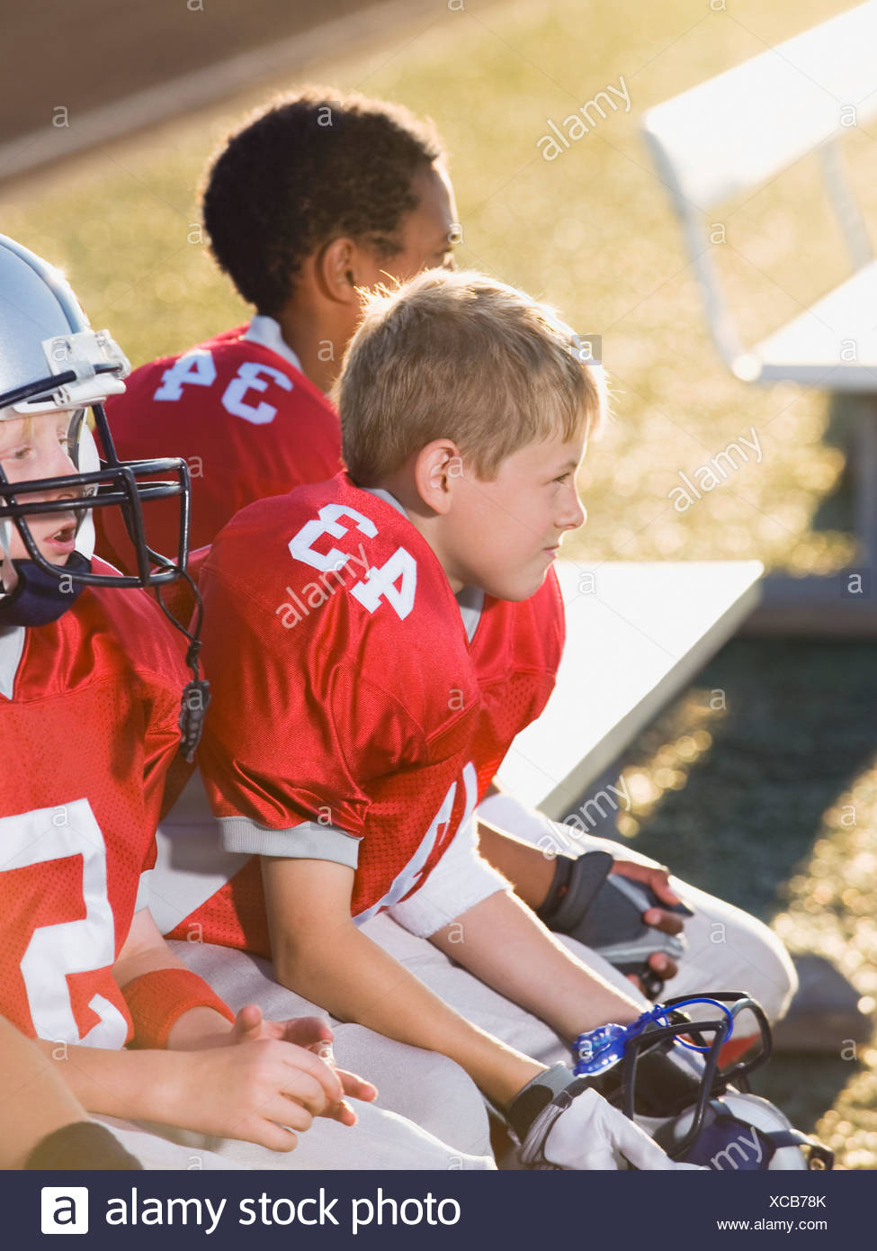 Football Players Sitting On Bench High Resolution Stock Photography and ...