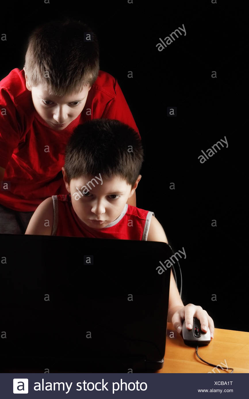 Boys Playing Computer Game High Resolution Stock Photography and Images ...