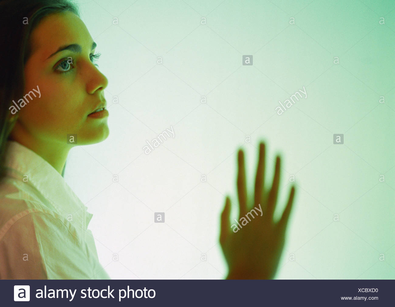 Hands Against Glass Door High Resolution Stock Photography and Images ...