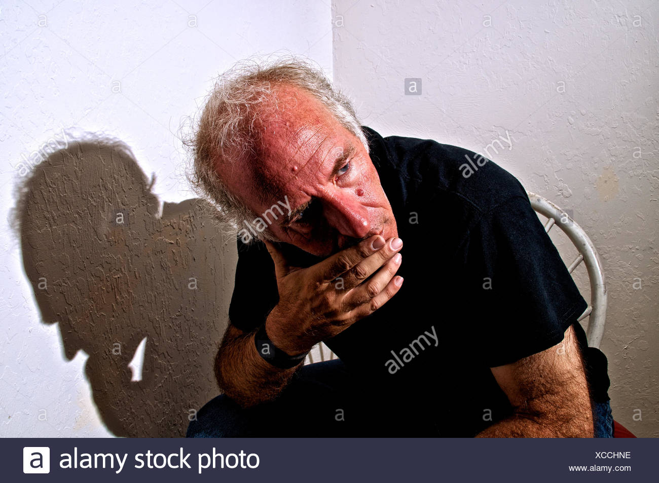 Man Sitting On Chair Leaning Forward High Resolution Stock Photography ...