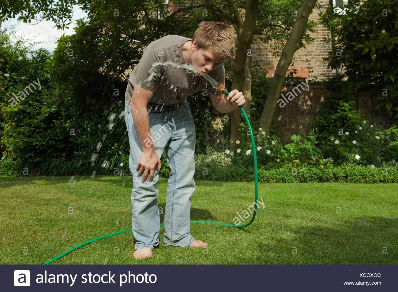 Young Teenager Drinking Water High Resolution Stock Photography and ...
