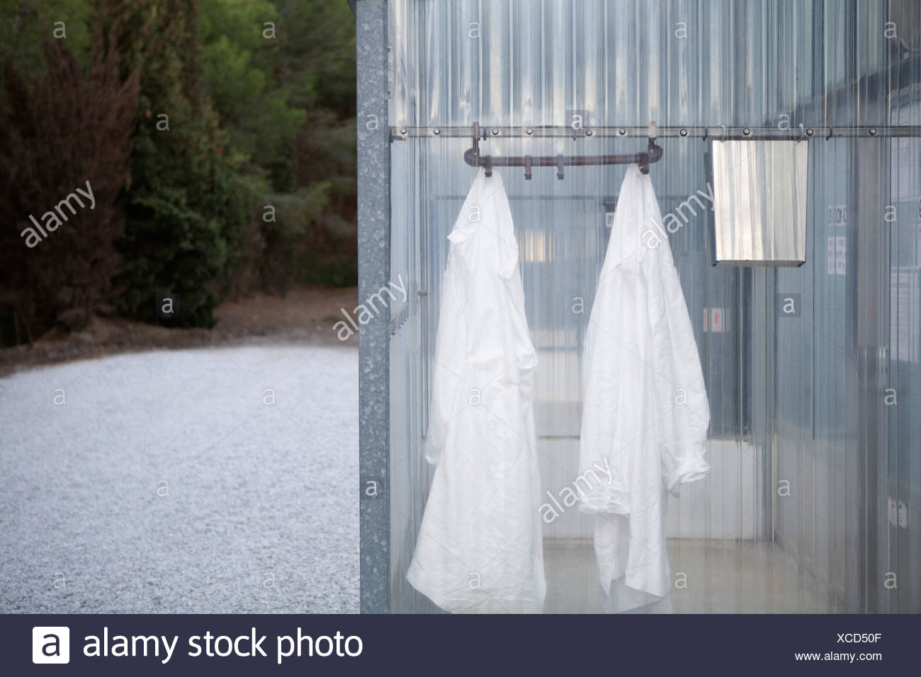Lab Coats Hanging High Resolution Stock Photography and Images - Alamy