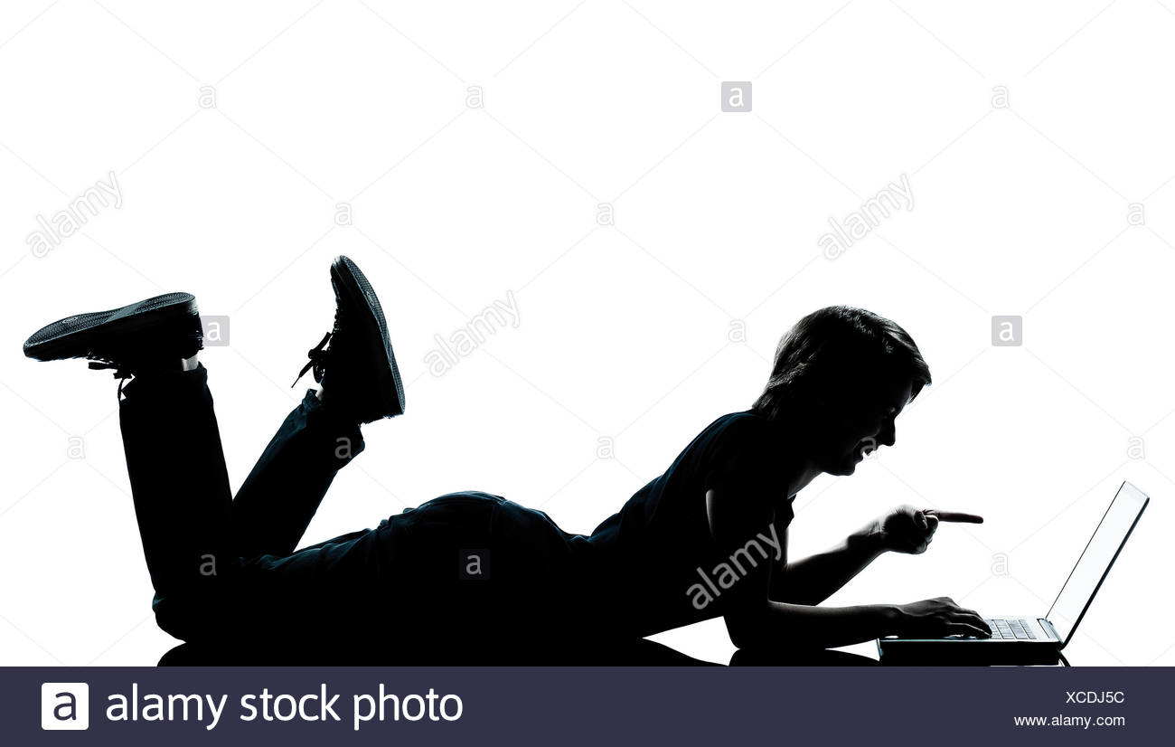 Child Using Laptop Silhouette Stock Photos & Child Using Laptop ...