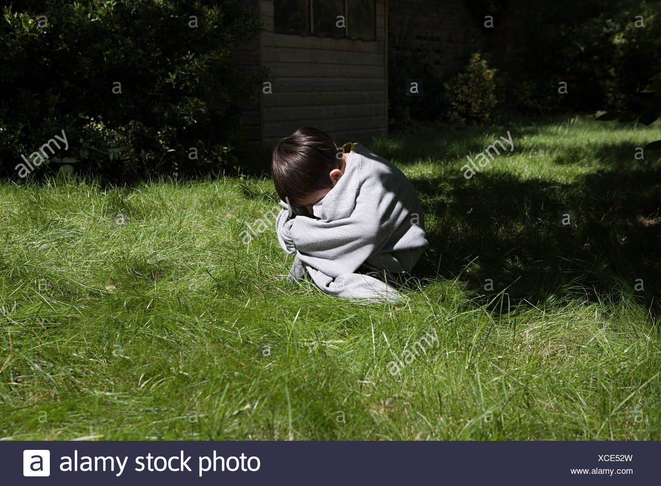 Person Cowering Stock Photos & Person Cowering Stock Images - Alamy