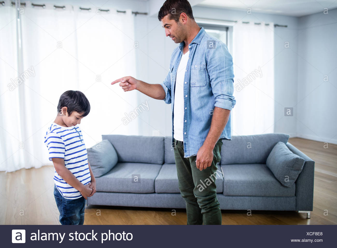 Father Scolding Son Stock Photos & Father Scolding Son Stock Images - Alamy