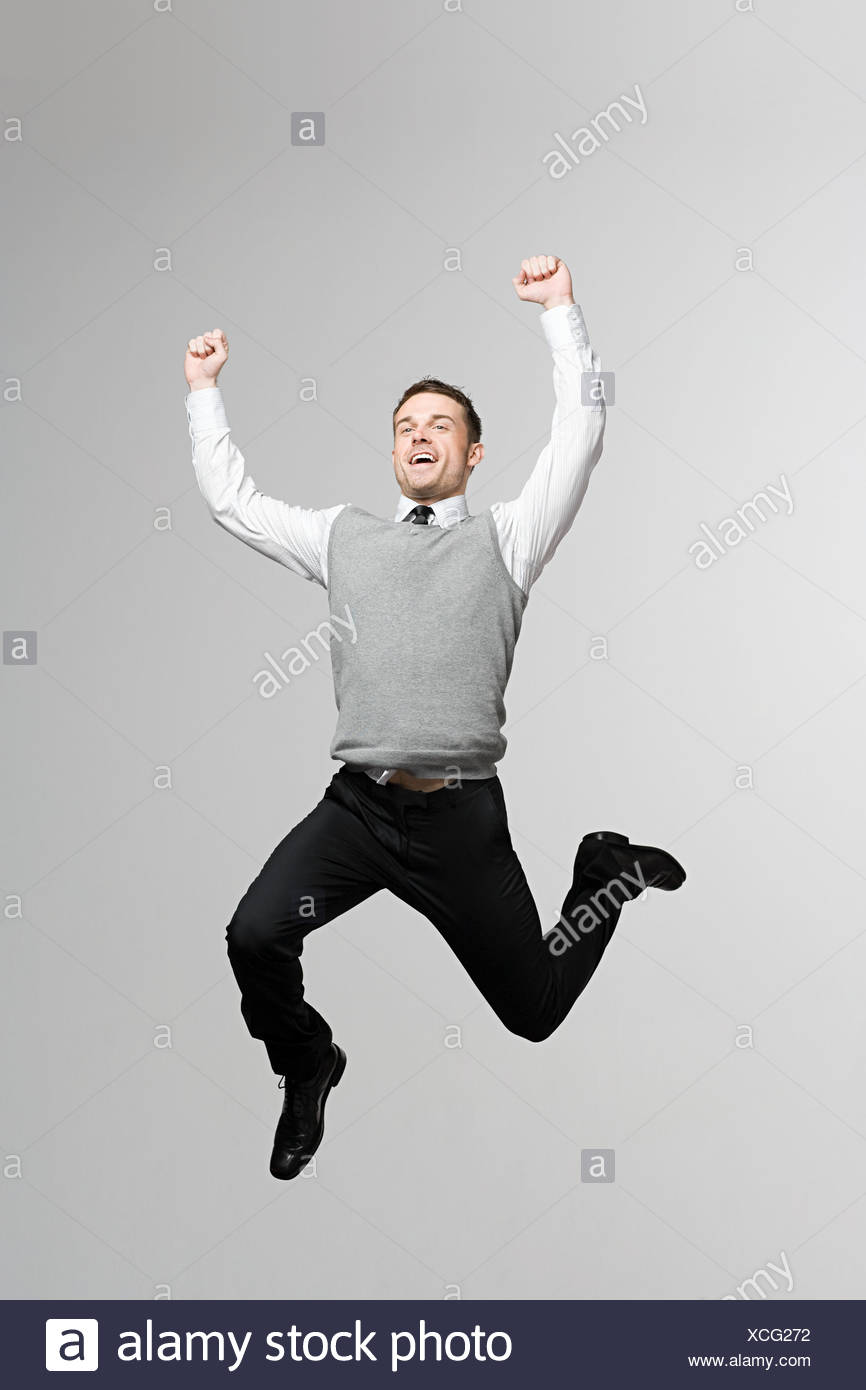 Man Jumping Joy Office Stock Photos & Man Jumping Joy Office Stock ...