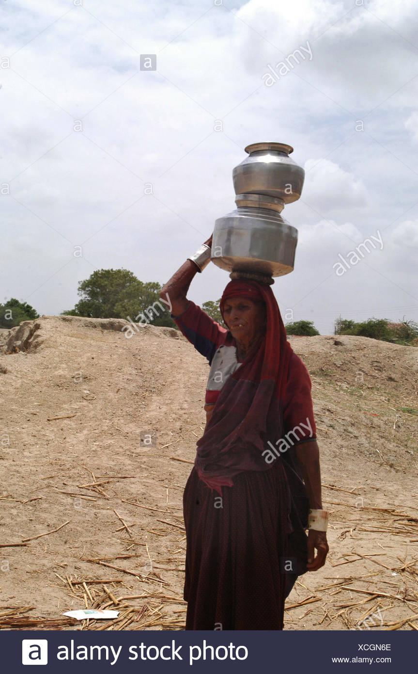 Tribal Women Carrying Water Pot High Resolution Stock Photography and ...