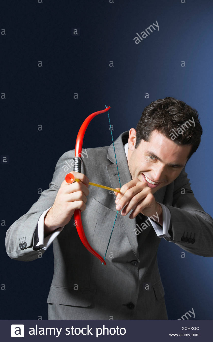 Man Aiming Bow Arrow Man Stock Photos & Man Aiming Bow Arrow Man Stock ...