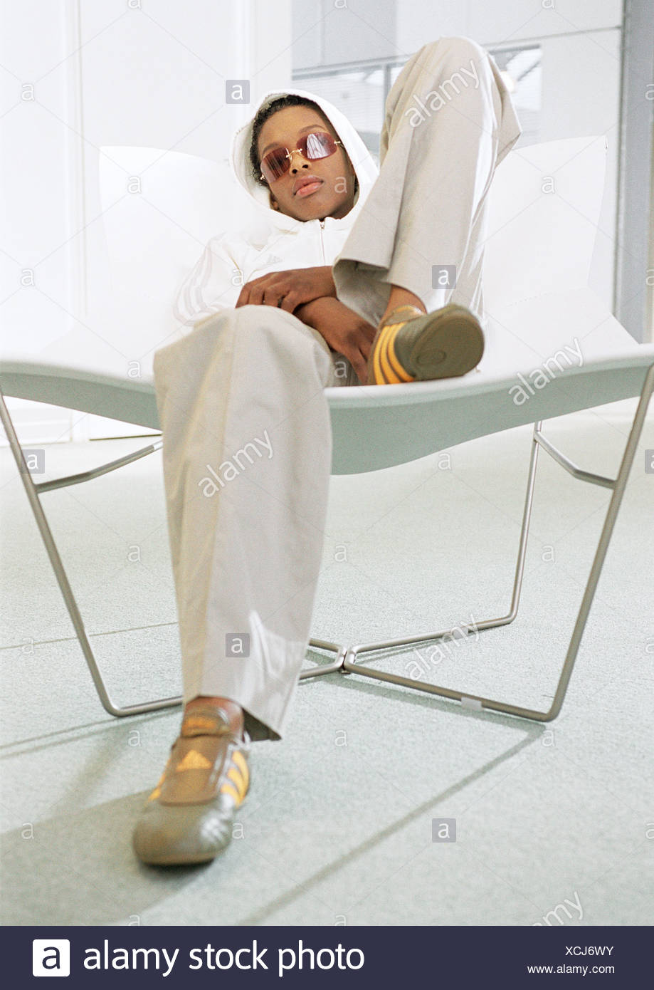 Woman One Leg Up On Chair High Resolution Stock Photography and Images ...