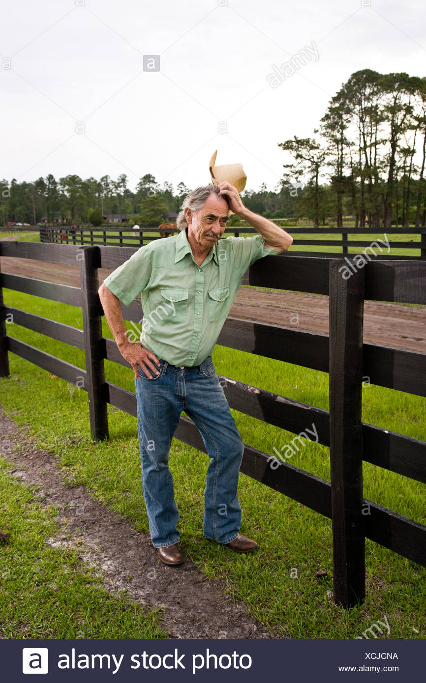 Cowboy Leaning On Fence High Resolution Stock Photography and Images ...