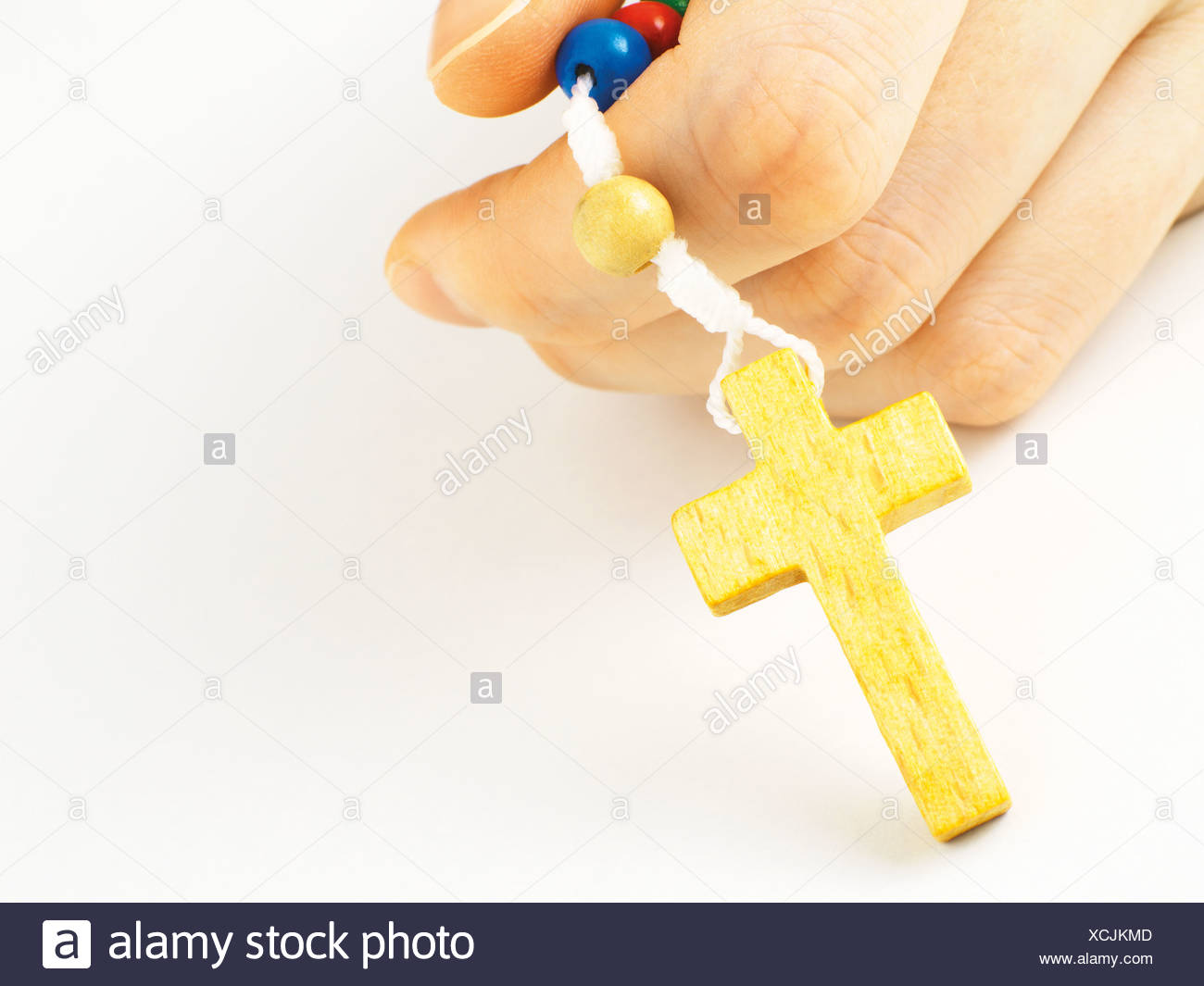 Hand Holding A Cross High Resolution Stock Photography and Images - Alamy