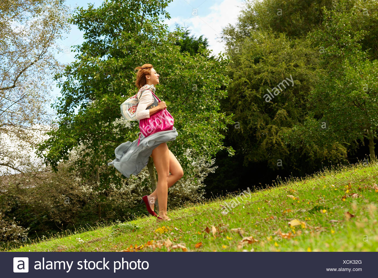 Dress Blowing In Wind High Resolution Stock Photography and Images - Alamy