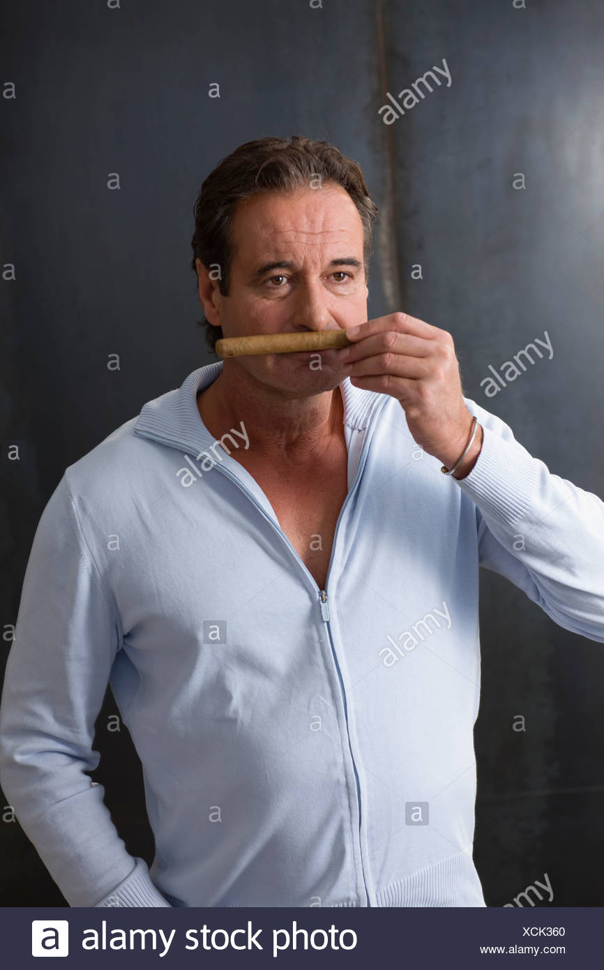 Cigar Smoking Man High Resolution Stock Photography and Images - Alamy