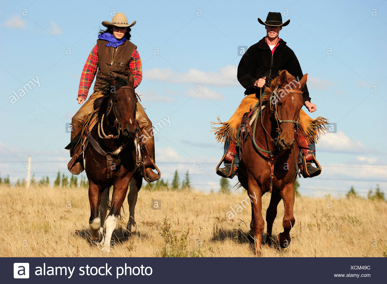 Two Cowboys Riding Horses High Resolution Stock Photography and Images ...