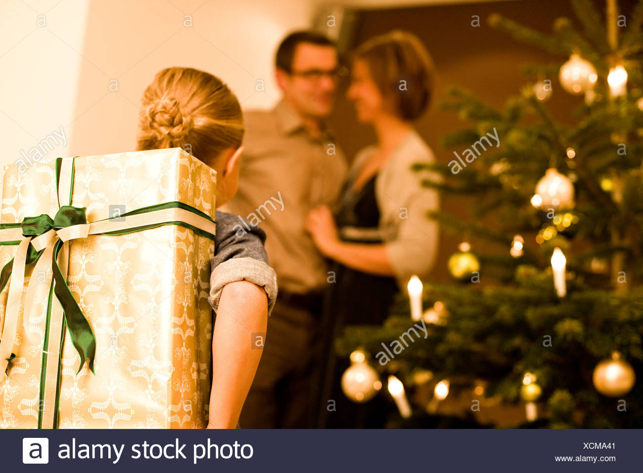 Girl Hiding Behind Man High Resolution Stock Photography and Images - Alamy