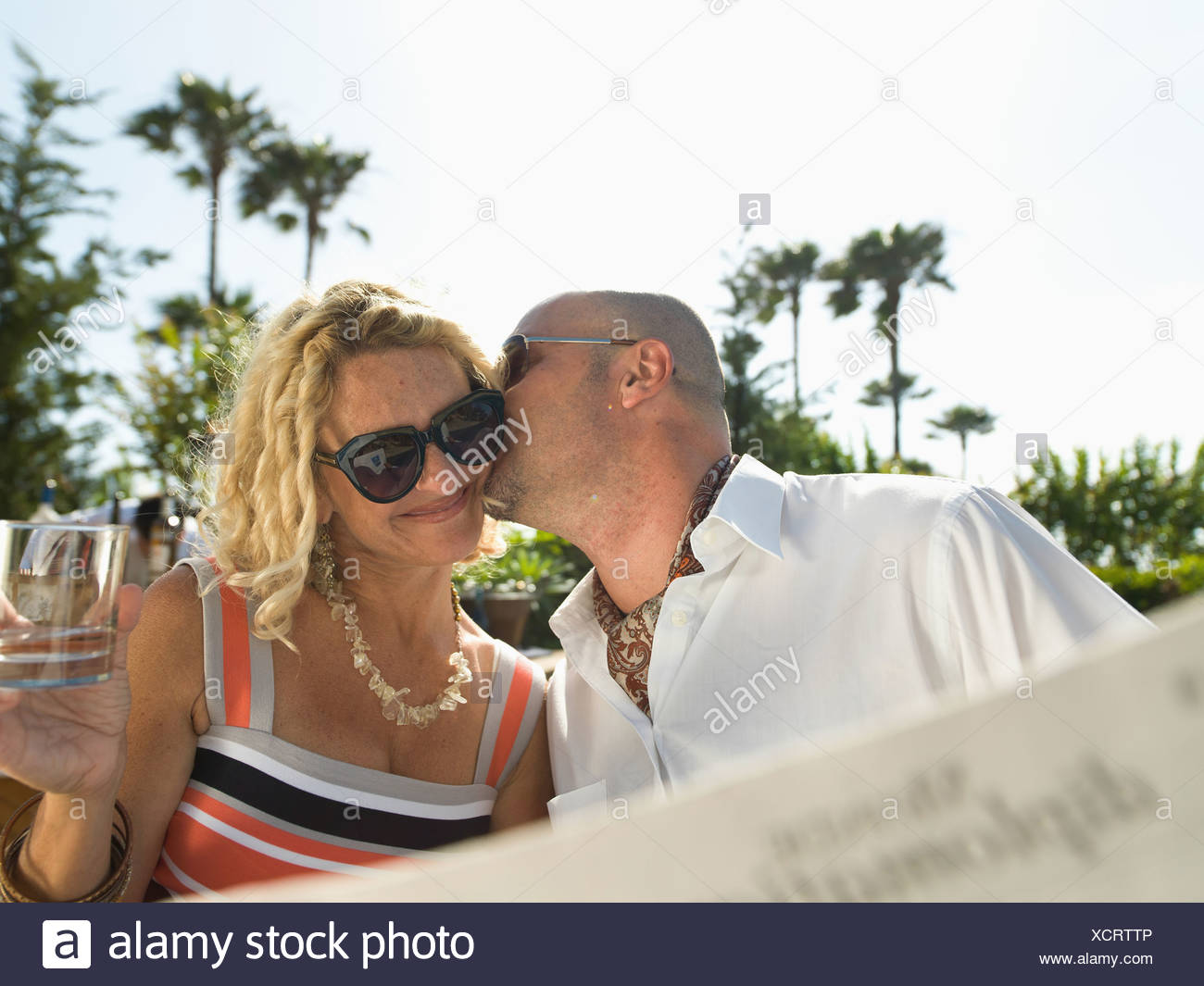 Couple Side By Side In Swimming Pool High Resolution Stock Photography ...