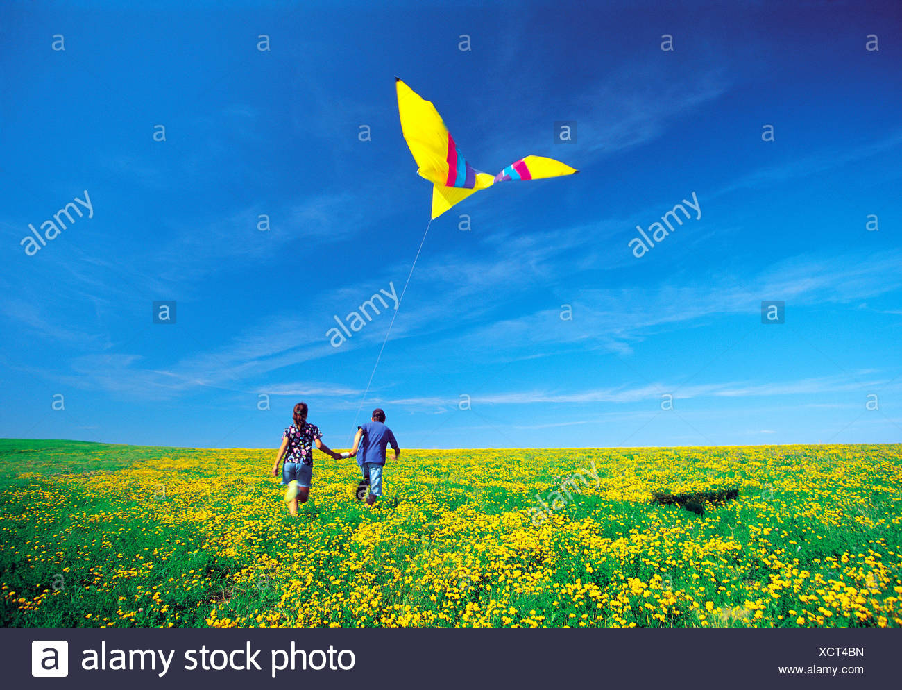 Boys Running Through Field High Resolution Stock Photography and Images ...