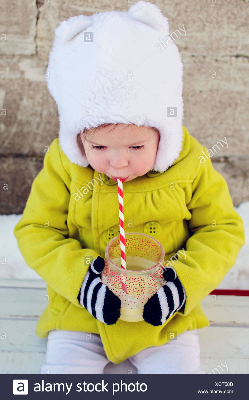 Child Drinking Through Straw Stock Photos & Child Drinking Through ...