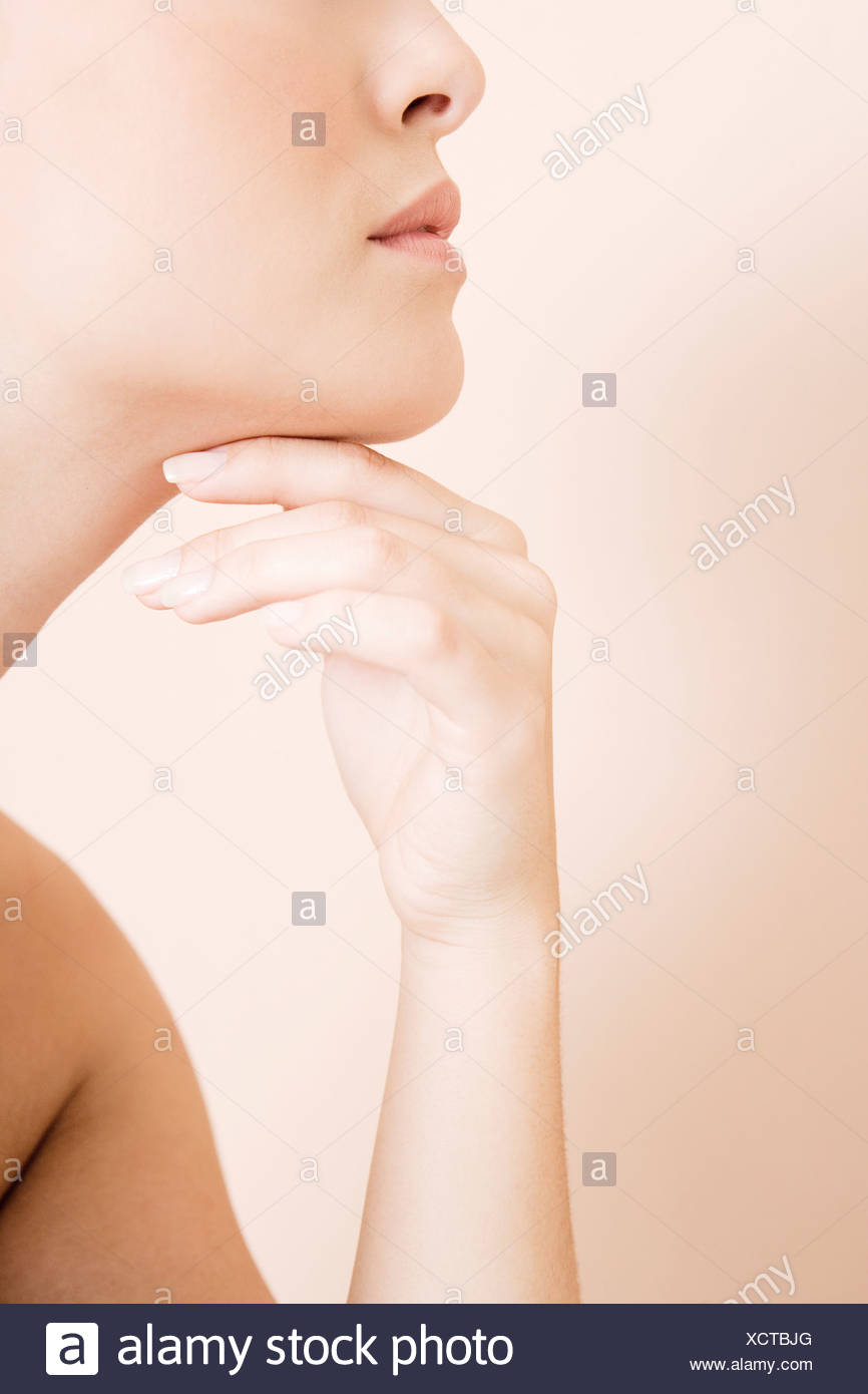 Young Woman Hand Under Chin Stock Photos & Young Woman Hand Under Chin ...