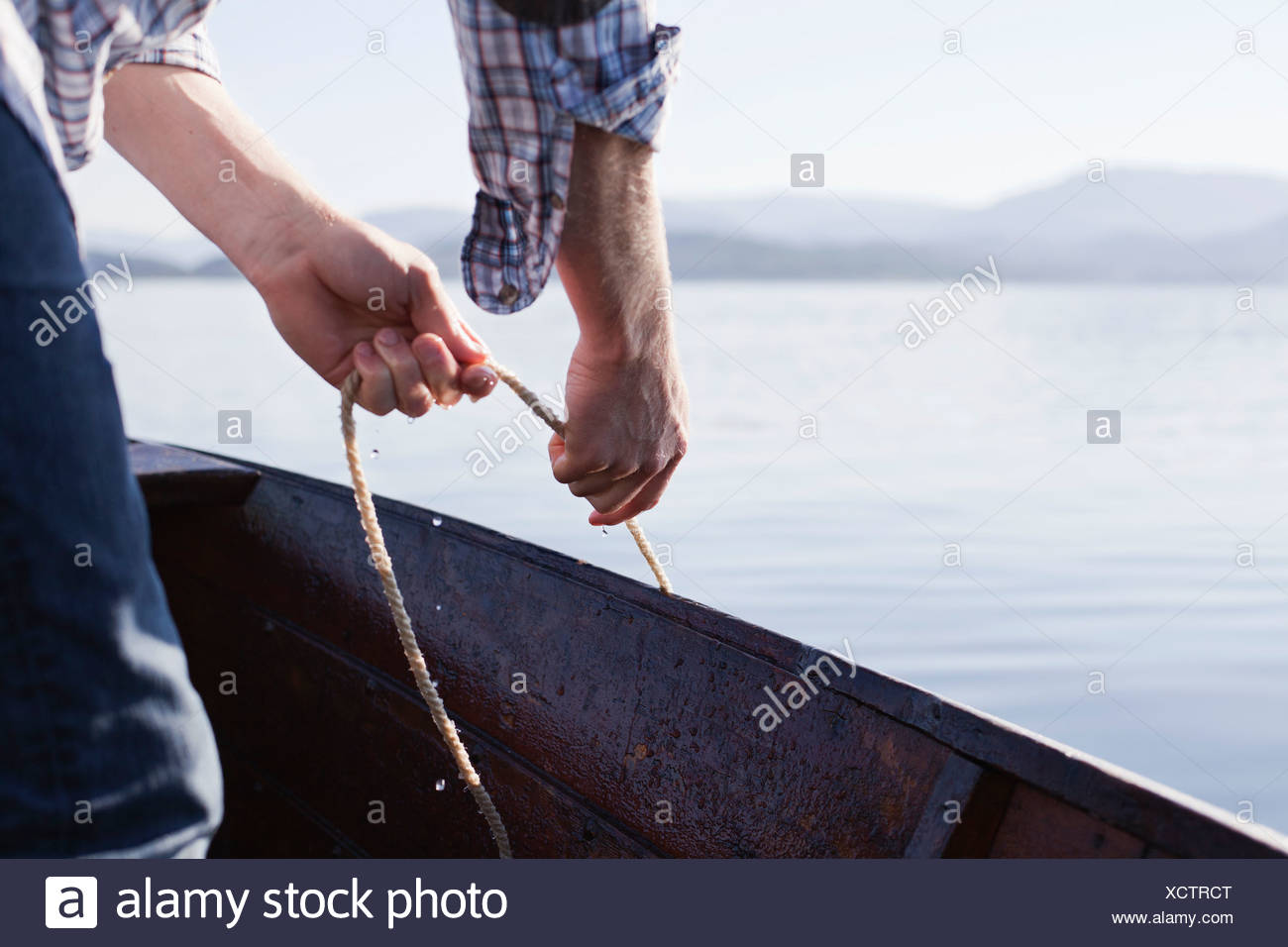 Man Pulling On Rope High Resolution Stock Photography and Images - Alamy