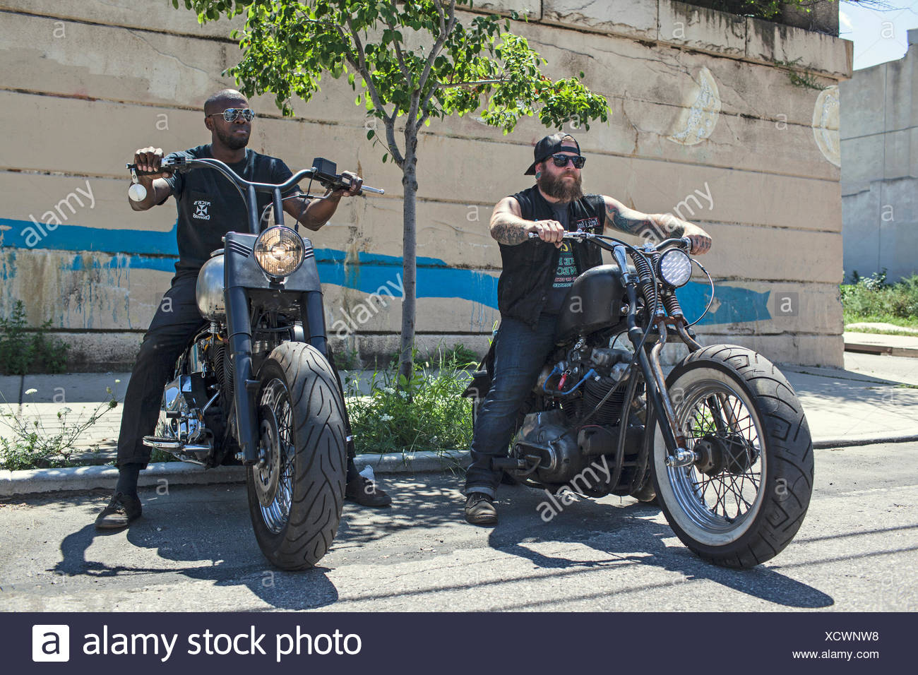Two Young Men On Motorcycles Stock Photos & Two Young Men On ...