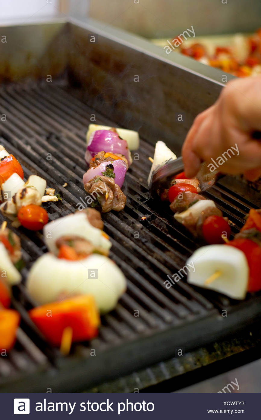 Cooking On Grill High Resolution Stock Photography and Images - Alamy