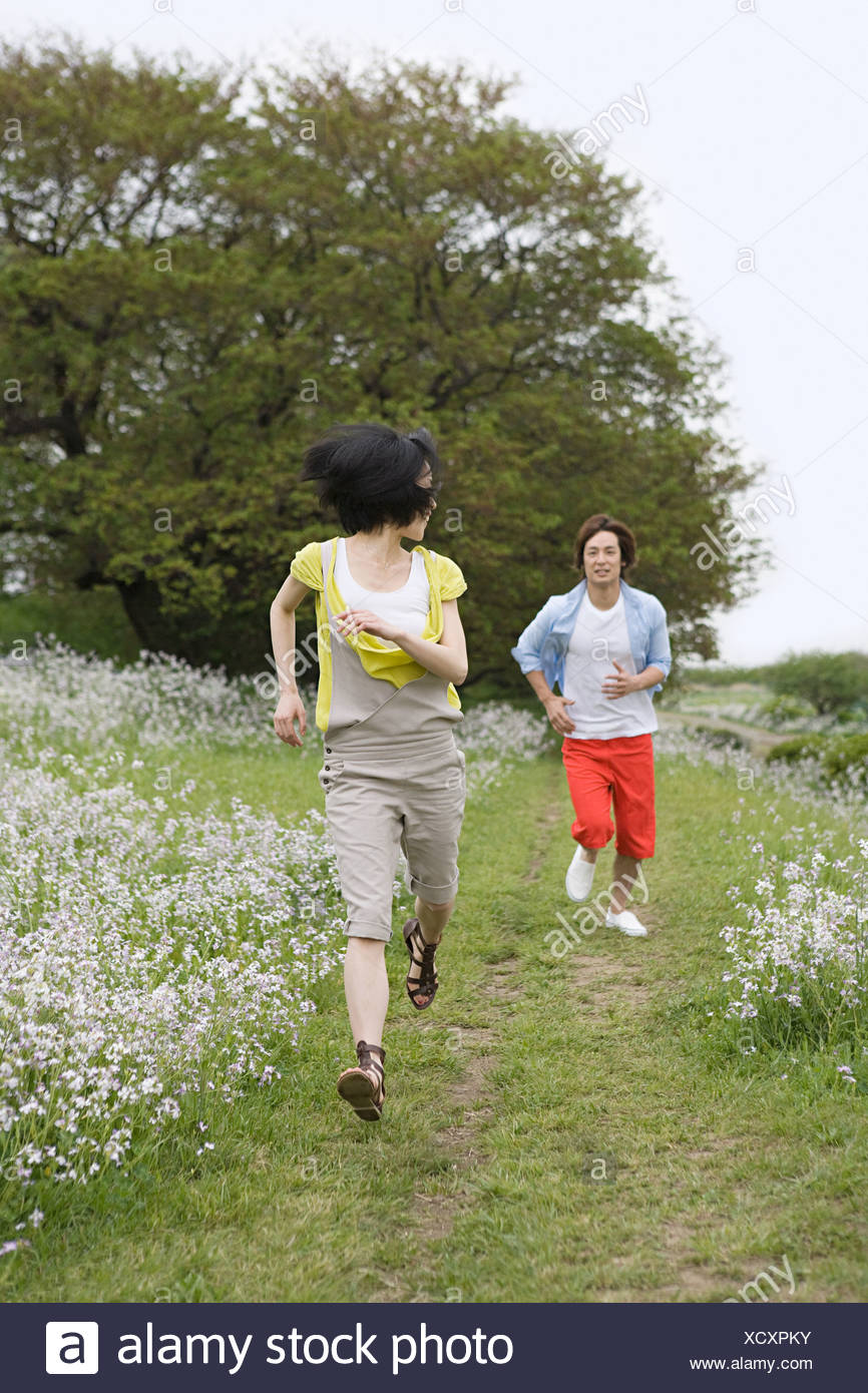 Man Looking Over Shoulder Running High Resolution Stock Photography and ...