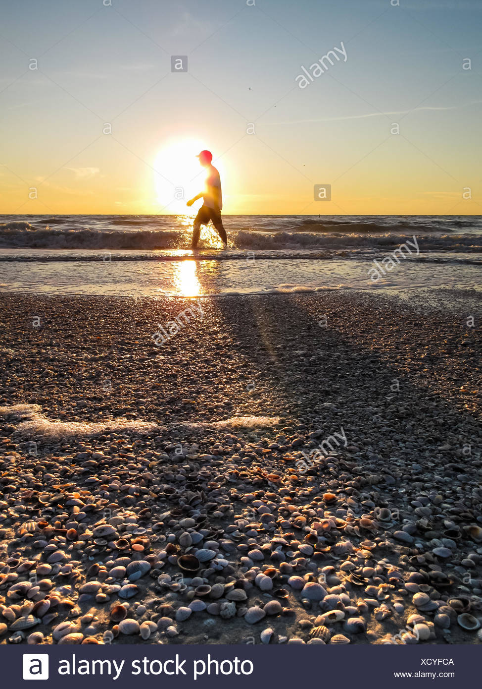 Walking At The Sunset High Resolution Stock Photography and Images - Alamy