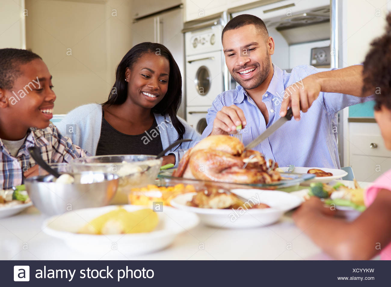 Family Parents Children Table Talking High Resolution Stock Photography ...