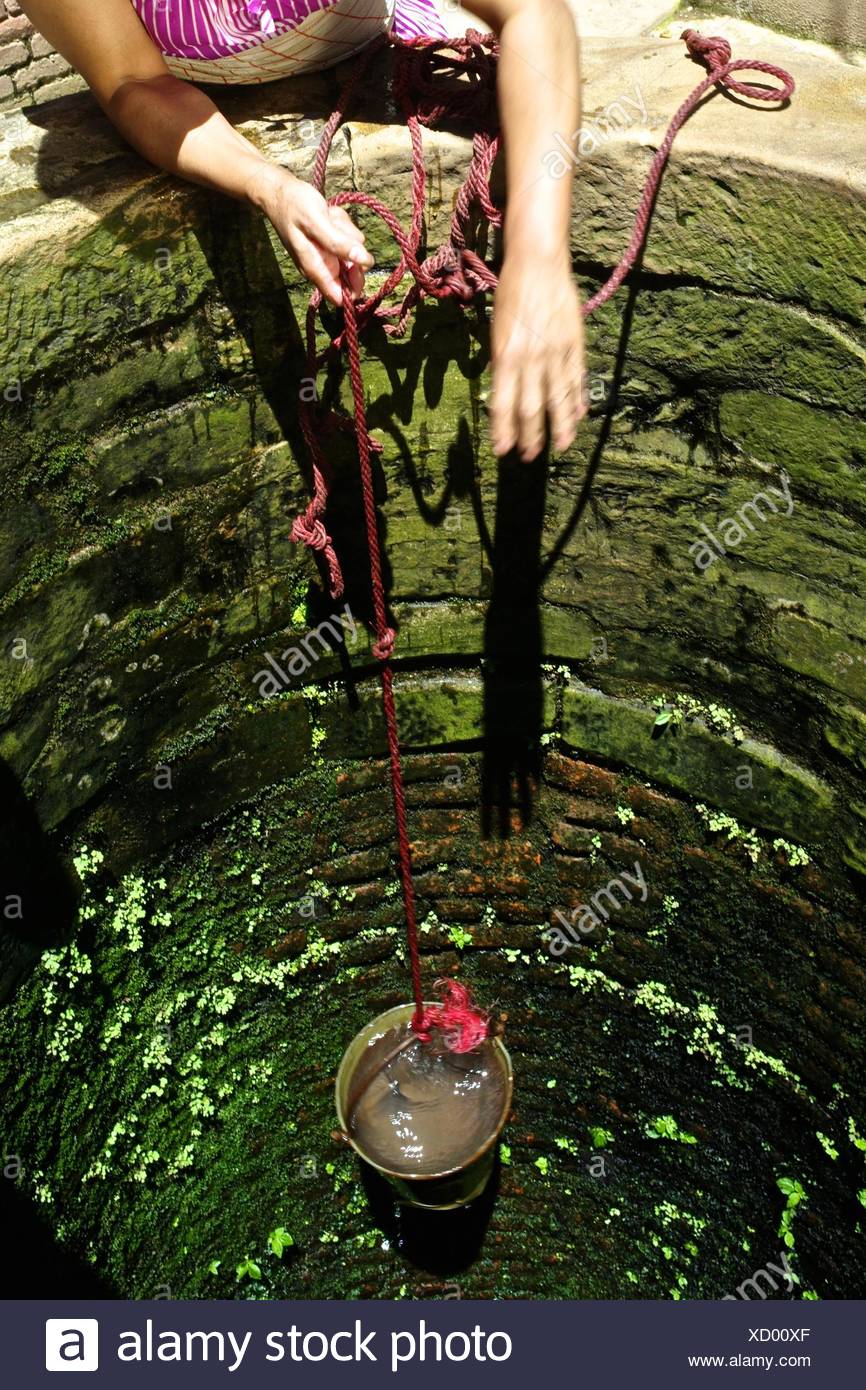 Pulling Water Well High Resolution Stock Photography and Images - Alamy