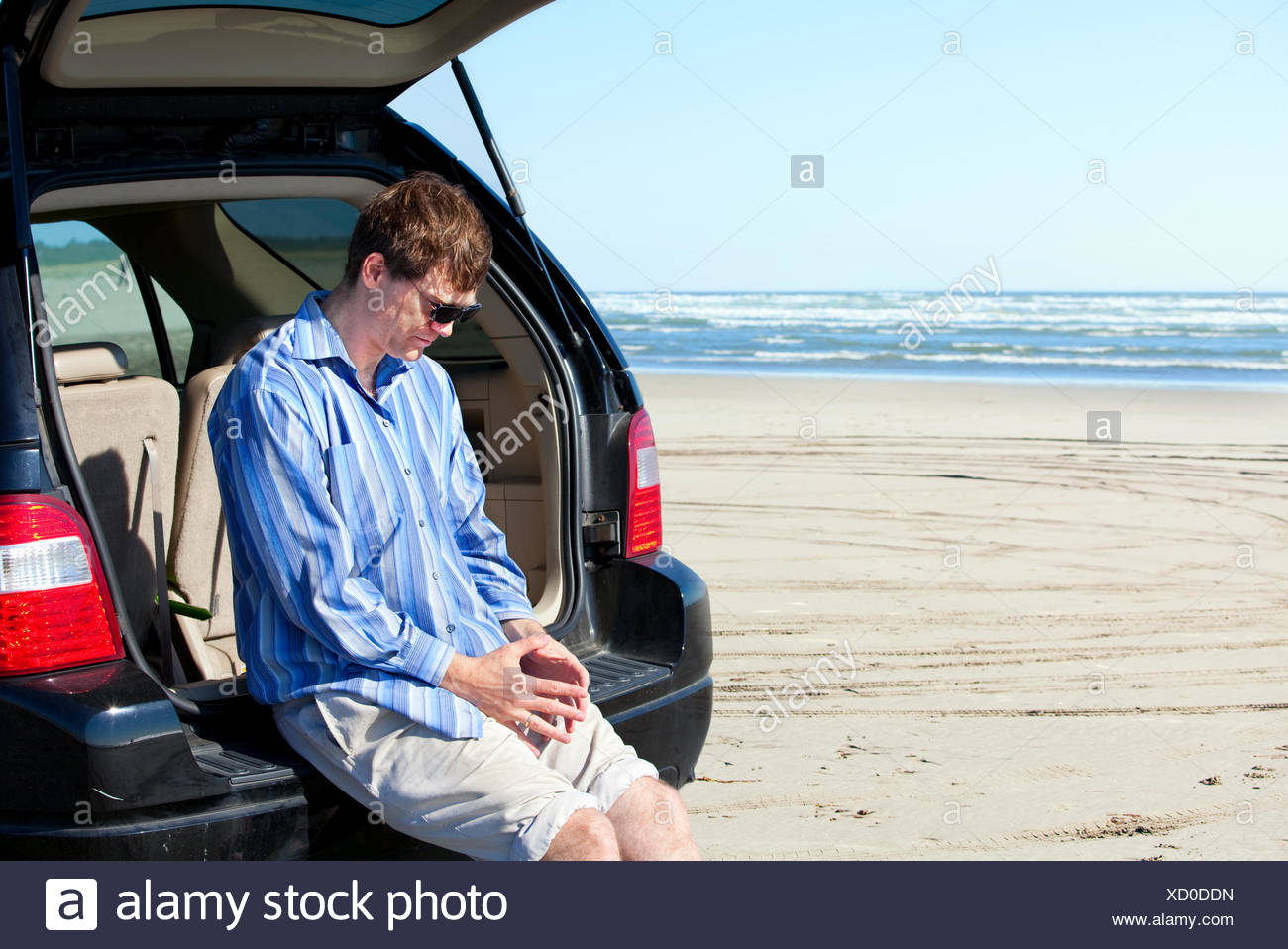 Dejected Man Looking Down Stock Photos & Dejected Man Looking Down ...